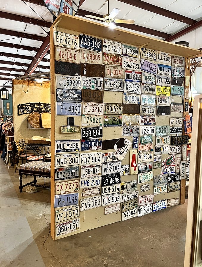 License plate paradise! This ingenious display showcases America's road history—each plate a tiny time capsule from someone's cross-country adventures.