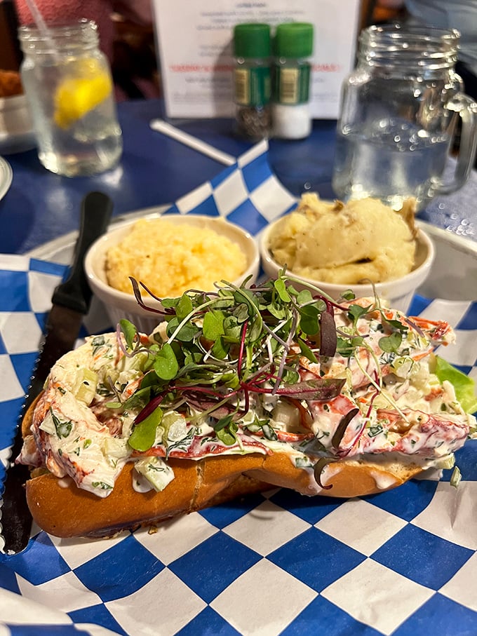 Not all heroes wear capes—some come on split-top rolls. This Maine-style lobster roll, adorned with microgreens, is summer vacation in sandwich form.