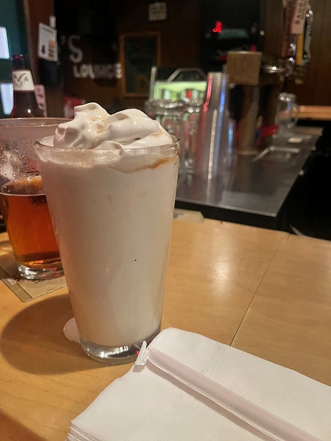 A hand-scooped milkshake that's so thick, your straw stands at attention. This creamy masterpiece isn't just dessert—it's therapy in a glass.