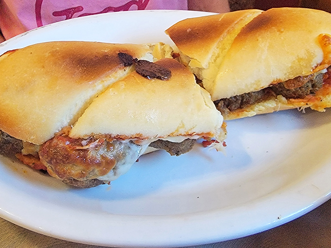 The legendary meatball sub in all its glory—where perfectly seasoned meatballs, rich tomato sauce, and melted cheese create a holy trinity of sandwich perfection.