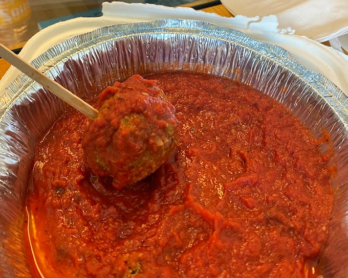 This isn't just any meatball—it's the protagonist in a saucy drama that deserves its own Netflix special.
