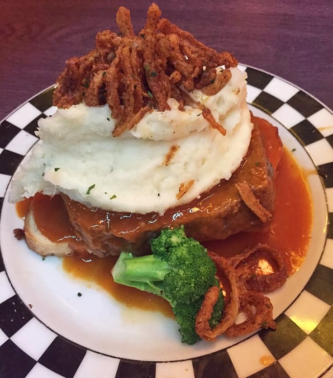 Behold the legendary meatloaf – a towering monument to comfort food that makes grandma's version seem like amateur hour.