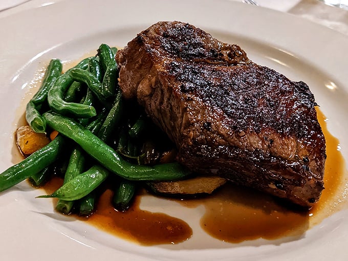 The star of the show! This NY Strip steak with its perfect sear and vibrant green beans is why people willingly sit in Florida traffic.