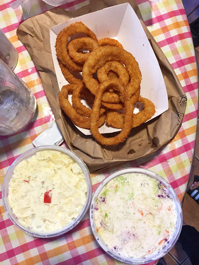 These onion rings aren't just sides—they're crispy, golden halos of happiness that deserve their own fan club.