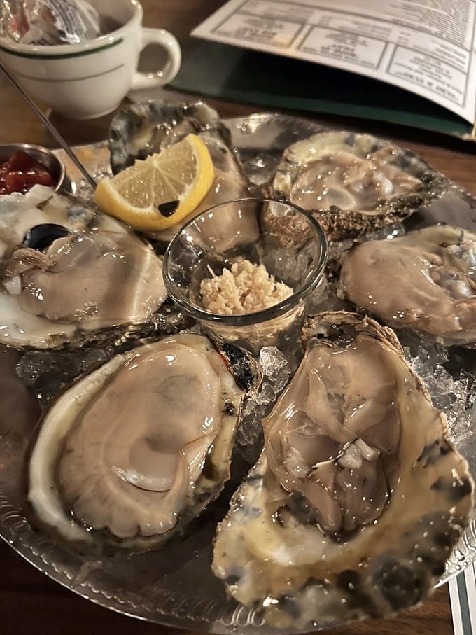 Fresh oysters on ice—nature's perfect appetizer. These briny treasures need nothing more than a squeeze of lemon and perhaps a touch of horseradish courage.
