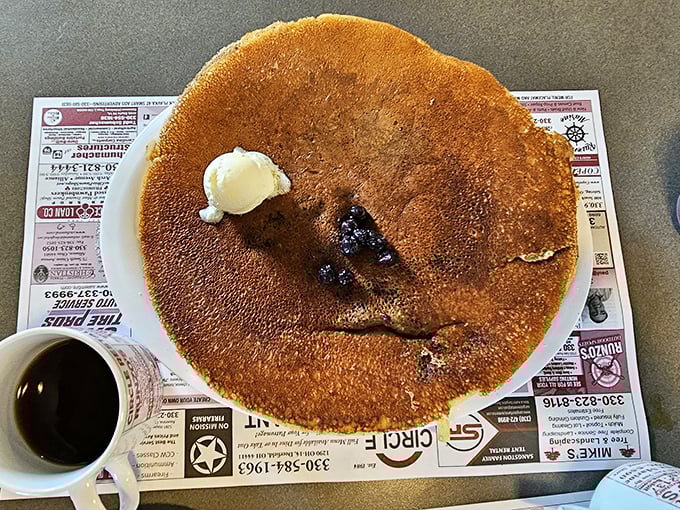 Behold the pancake that launched a thousand return visits—golden-brown perfection that makes IHOP executives wake up in a cold sweat.