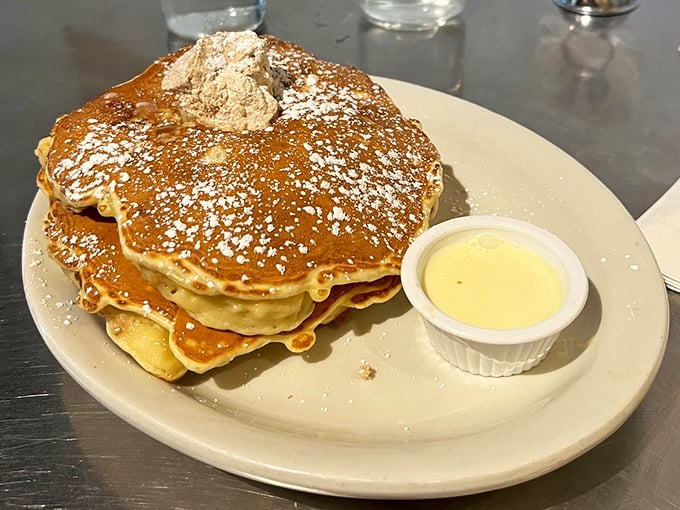 Golden-brown pancake perfection that makes you wonder if you've been doing breakfast wrong your entire life. That cup of anglaise? Liquid gold.