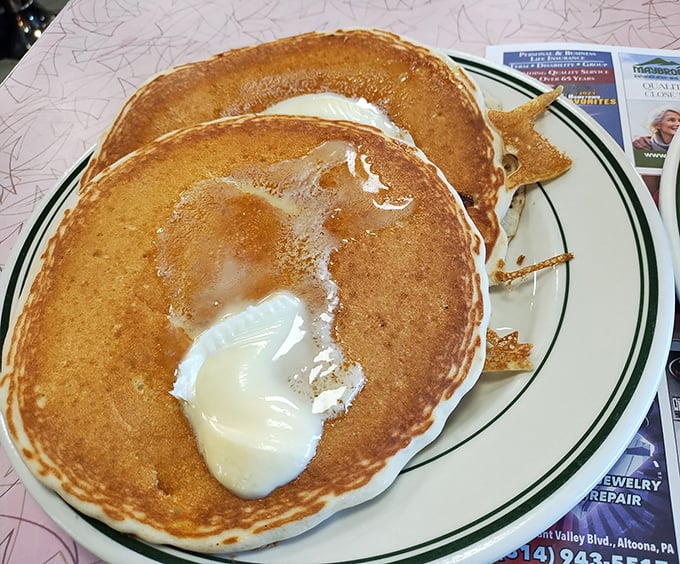 These pancakes aren't just golden brown, they're practically currency in the breakfast economy—fluffy, buttery, and worth every calorie.