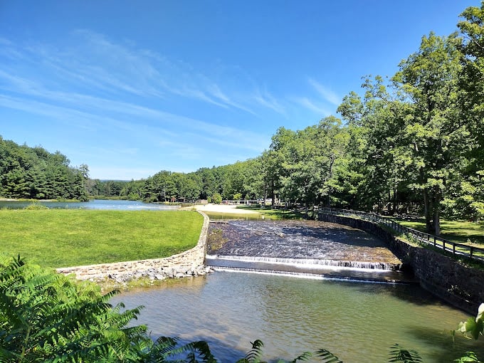 Engineering meets enchantment at the historic dam, where rushing waters create a soothing soundtrack for afternoon contemplation.