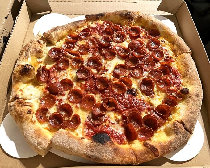Pepperoni that curls into perfect little flavor cups? This isn't just pizza—it's edible architecture with a PhD in deliciousness.