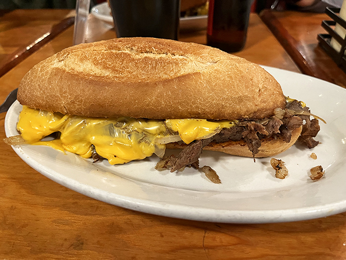 Behold the Philly cheesesteak in all its melty glory—tender beef and gooey cheese nestled in a perfect roll. Philadelphia might demand its passport.