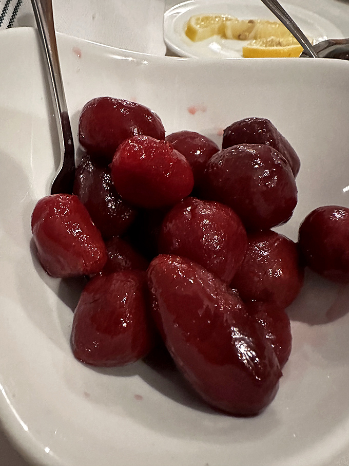These glistening pickled beets aren't just a side dish—they're ruby jewels of tangy sweetness that have launched a thousand family dinner memories.