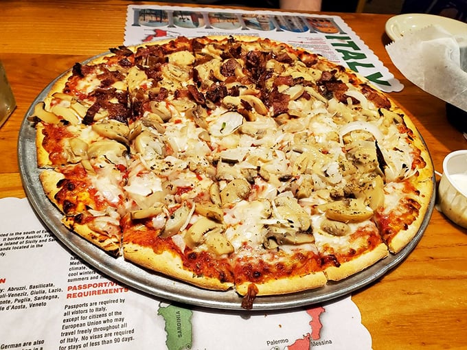 This isn't just pizza; it's a masterpiece of mushrooms and chicken atop that perfect crust—crispy outside, chewy inside. One bite and you'll understand why locals keep coming back.