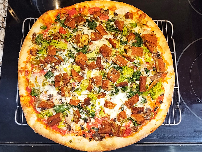 This isn't just pizza – it's a masterpiece of balance. Crispy crust, vibrant sauce, melty cheese, and toppings that know their role.