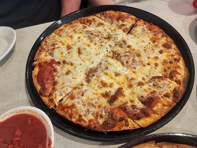 This isn't just pizza—it's edible artwork. The perfect balance of cheese, sauce, and that crust that somehow manages to be both crisp and chewy.