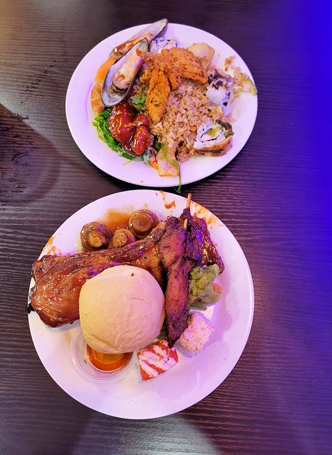 Buffet strategy in action: a little of everything becomes a masterpiece of excess. The plate says "I came prepared."