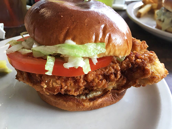The legendary pork tenderloin – where the meat extends beyond the bun like Indiana hospitality extends beyond expectations.