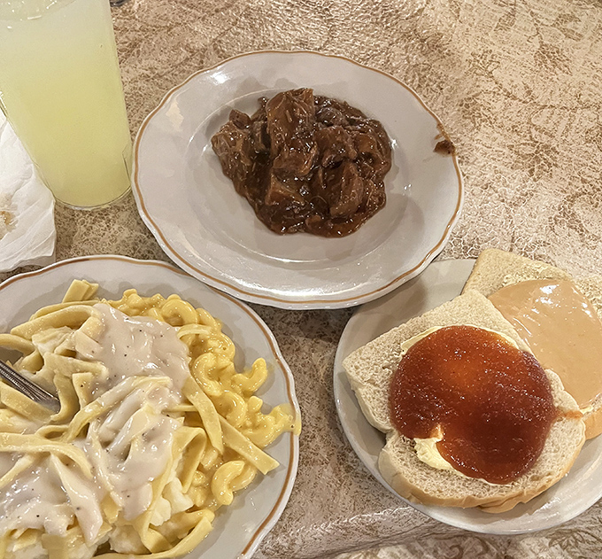 
Comfort food trifecta! Tender pot roast, creamy noodles, and bread with apple butter—a plate that would make your grandmother both proud and jealous. 
