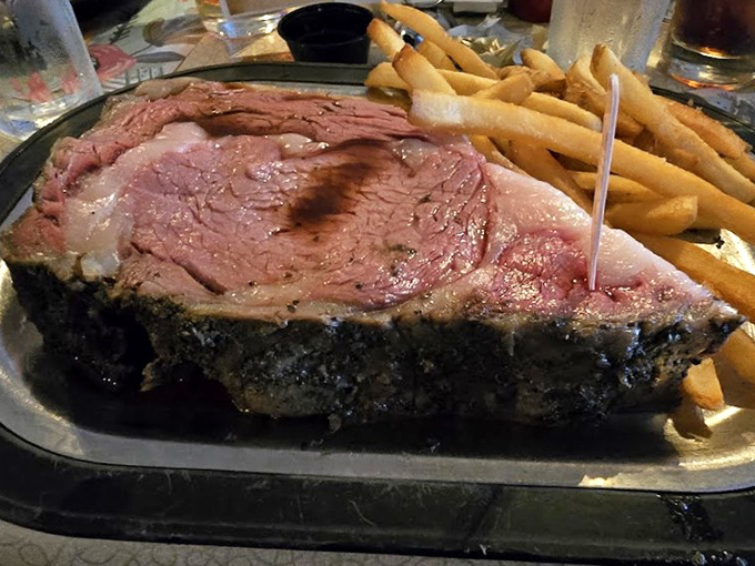 Behold the crown jewel – prime rib so perfect it practically glows with beefy magnificence.