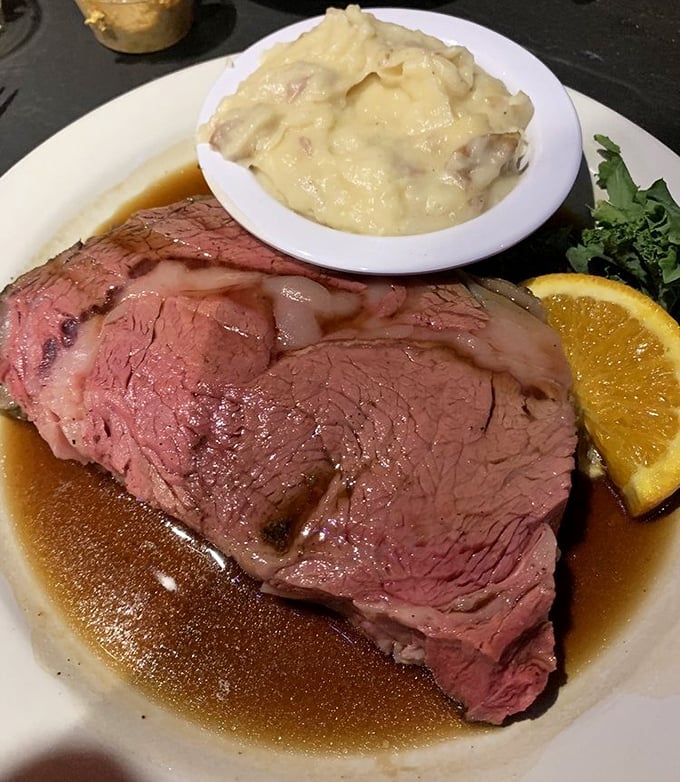 Behold the prime rib that launched a thousand return visits – perfectly pink, gloriously juicy, absolutely magnificent.