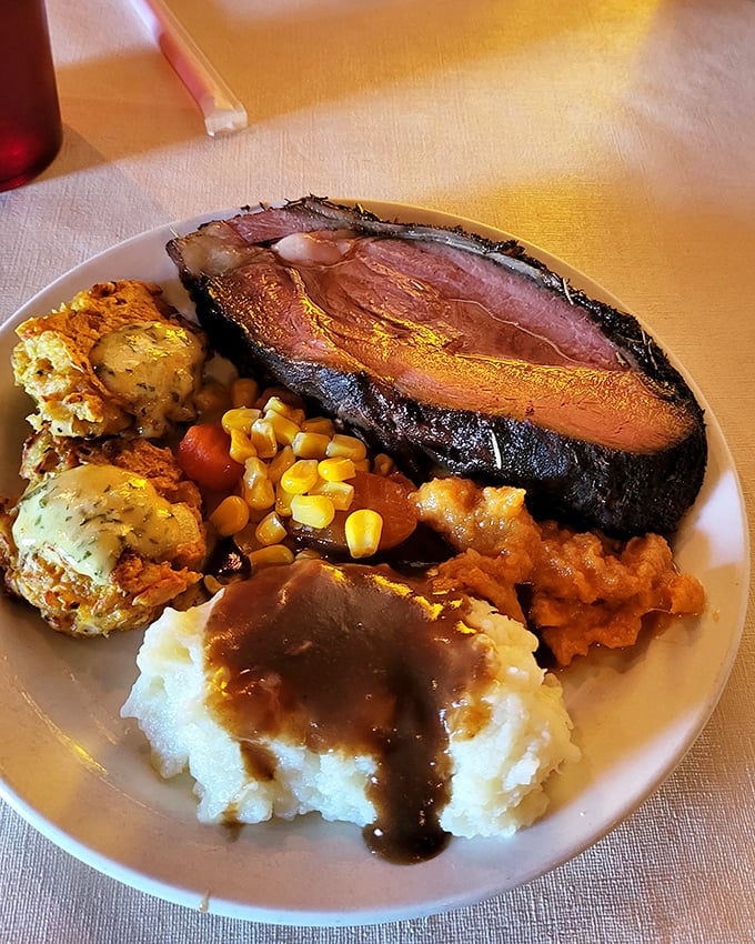 Prime rib that doesn't just melt in your mouth – it practically serenades your taste buds while the sides huddle around like delicious backup singers.
