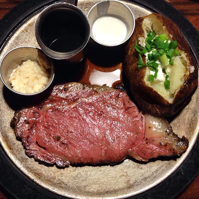 This prime rib isn't just dinner—it's a religious experience. The perfect pink center surrounded by a seasoned crust is beef nirvana.