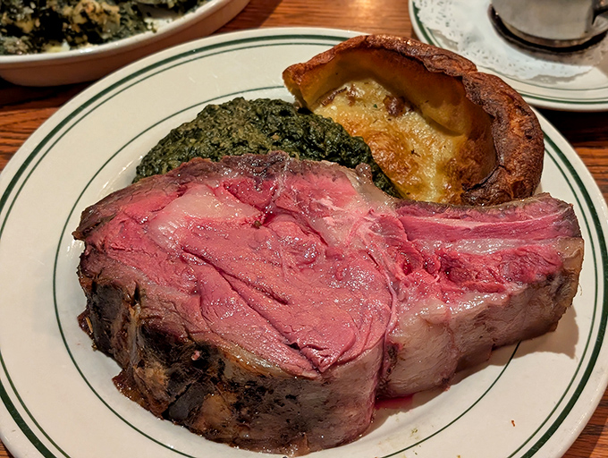 This prime rib isn't just dinner—it's a masterpiece of medium-rare perfection that makes vegetarians question their life choices.