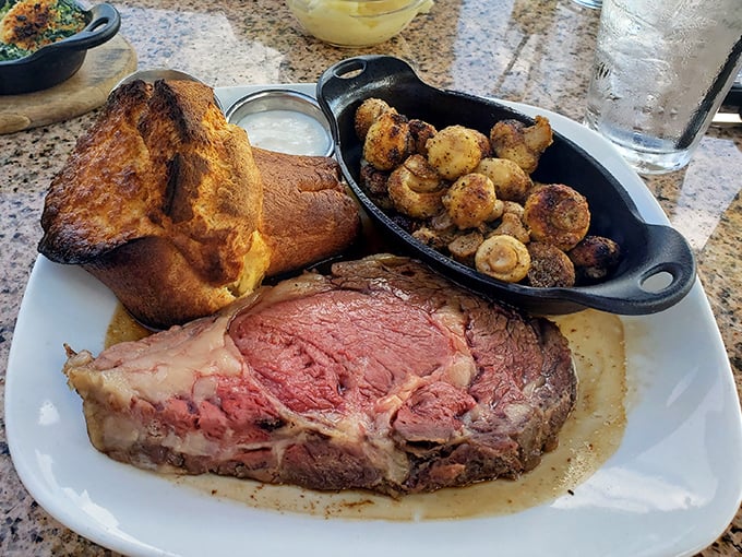This isn't just prime rib—it's a masterpiece of meat, accompanied by a Yorkshire pudding that defies gravity and mushrooms that found their purpose in life.
