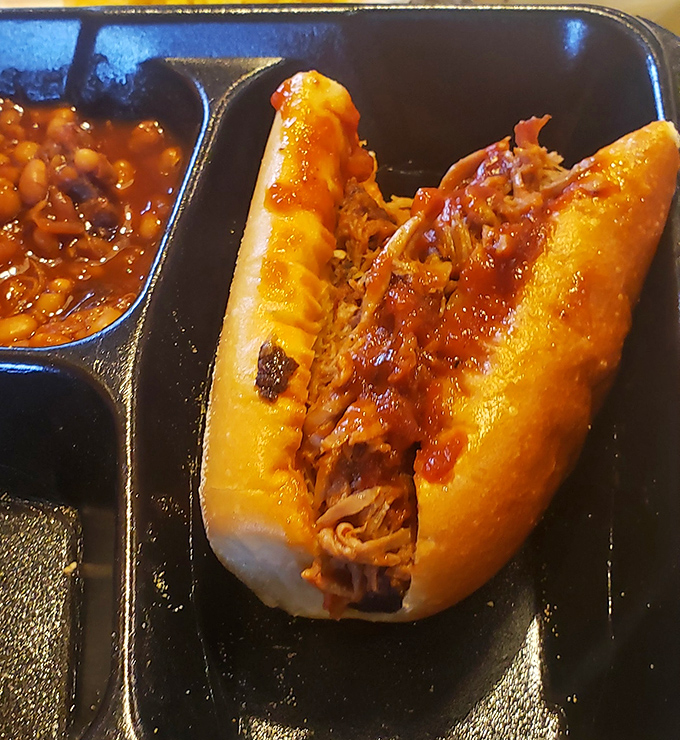 Not all heroes wear capes—some come on soft buns with a side of baked beans. This pulled pork sandwich might just change your definition of perfection.