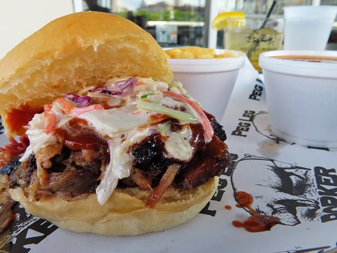 The pulled pork sandwich isn't just a meal—it's a masterpiece of smoke-kissed meat, tangy slaw, and sauce that'll make you question all other sandwiches.