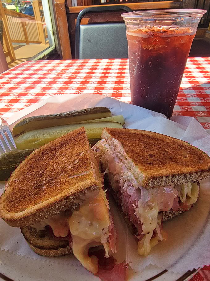The Reuben in all its glory – where corned beef, sauerkraut, and Swiss cheese perform a harmonious dance that would make Broadway choreographers jealous.
