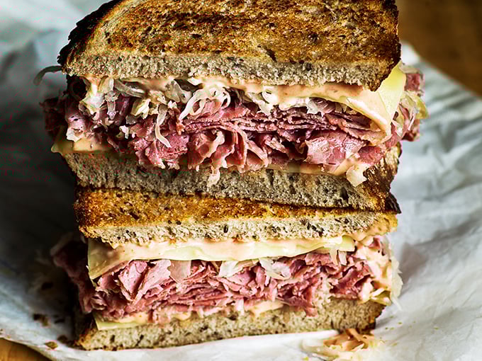 Behold the architectural marvel that is Katzinger's Reuben—layers of corned beef so perfect they could make a vegetarian question their life choices.