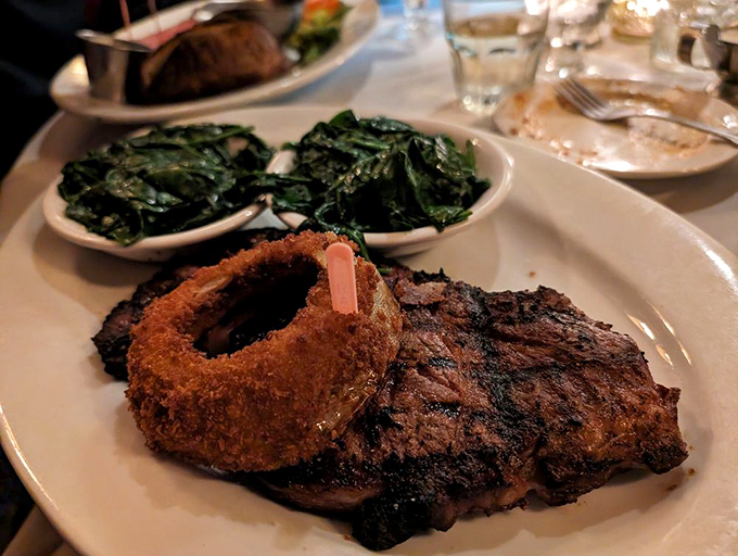 The star of the show arrives with a perfect char that makes neighboring diners experience immediate food envy.