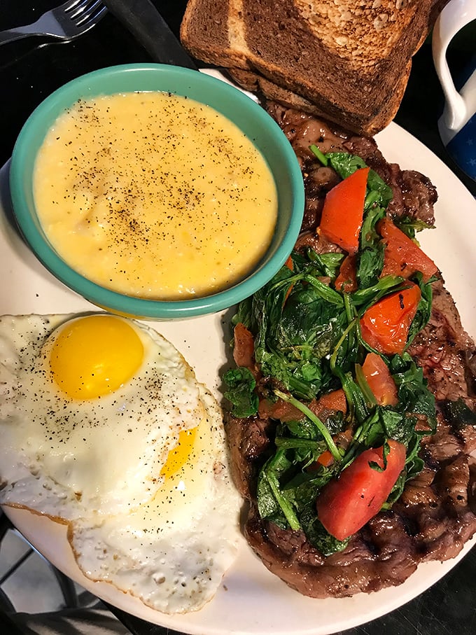 This ribeye arrives dressed to impress with fresh greens and tomatoes – it's like surf meeting turf's sophisticated cousin.