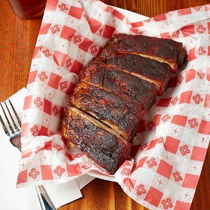 These ribs don't just fall off the bone—they perform a graceful dismount worthy of an Olympic gold medal, complete with a perfect smoke ring.