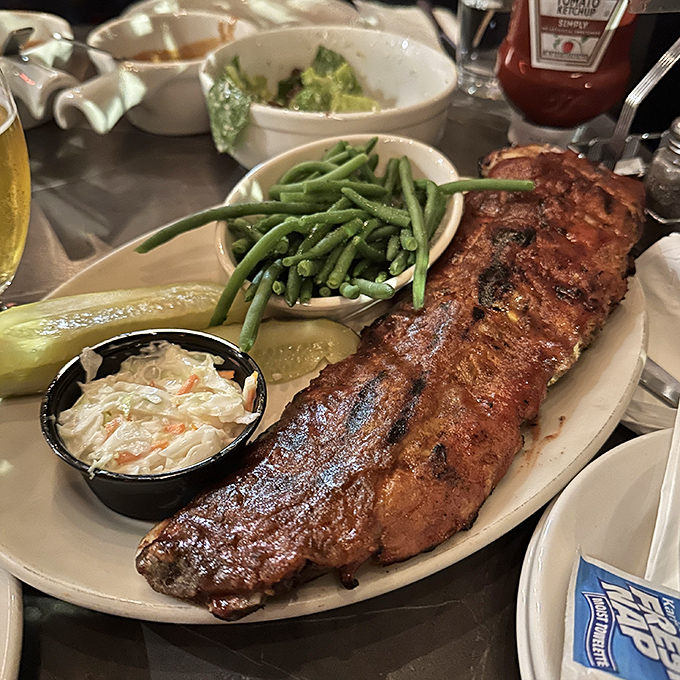 Behold the star of the show – fall-off-the-bone ribs that don't need a fancy introduction, just plenty of napkins and your undivided attention.