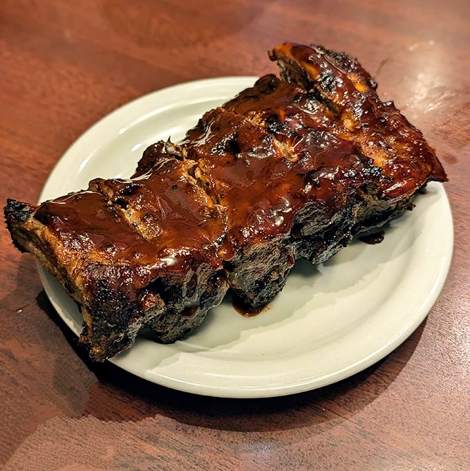 These ribs aren't "falling off the bone"—they're clinging to it with just the right amount of dignity. Barbecue perfection isn't about surrender.