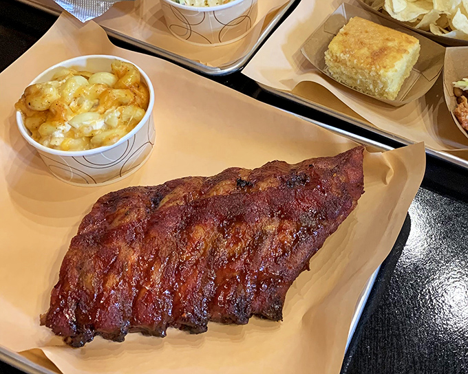 These ribs don't just fall off the bone—they practically leap into your mouth with a perfect bark that's worth the drive alone.