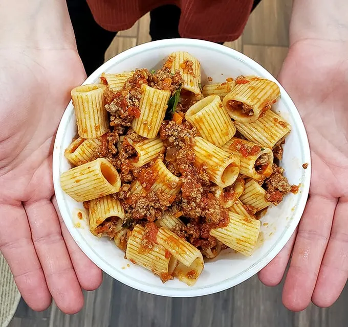 Rigatoni that doesn't just sit there looking pretty—it demands to be devoured. Those pasta tubes are little flavor tunnels for the robust sauce.