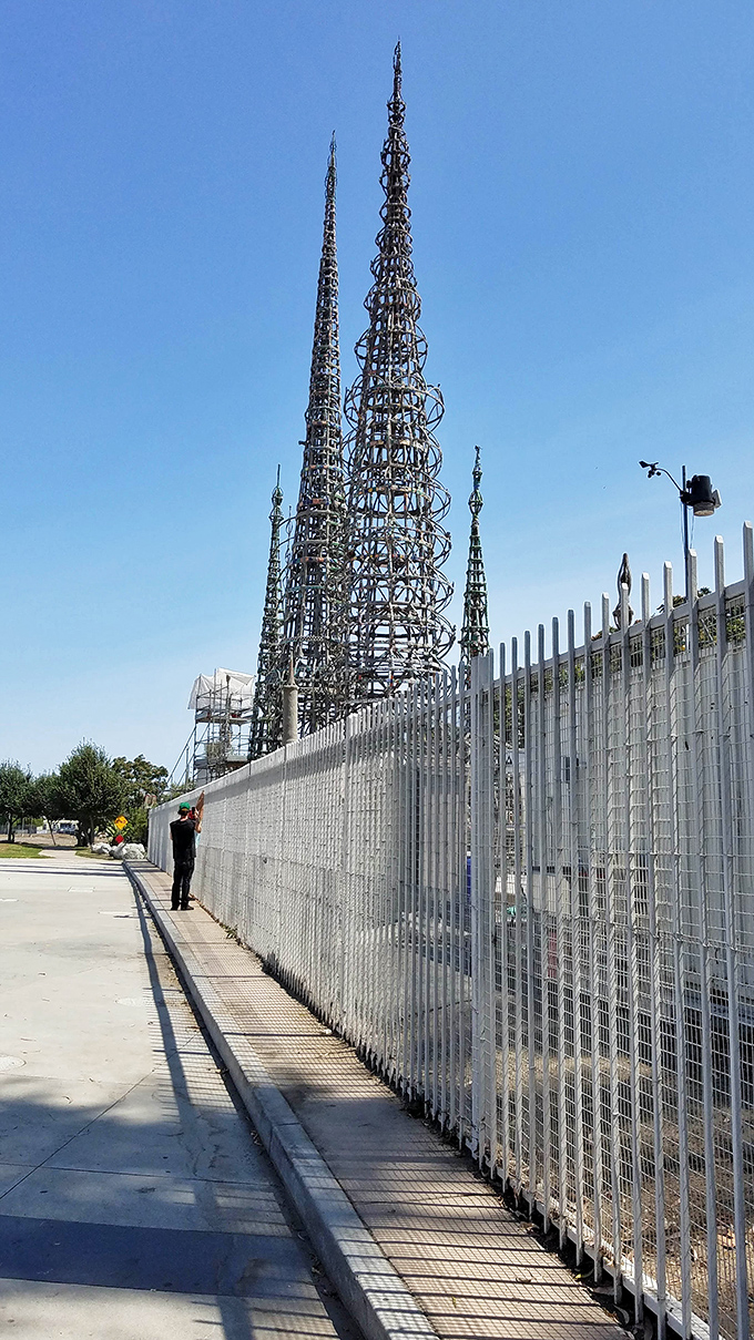 From this angle, the skeletal framework reveals itself—an intricate dance of steel and imagination that has withstood decades of earthquakes and skepticism.