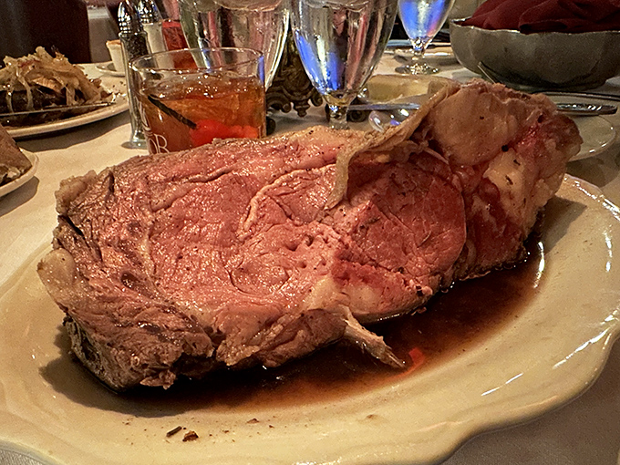 Behold the star of the show—HOBNOB's legendary roast beef, pink and perfect, sitting in a pool of savory au jus that deserves its own fan club.