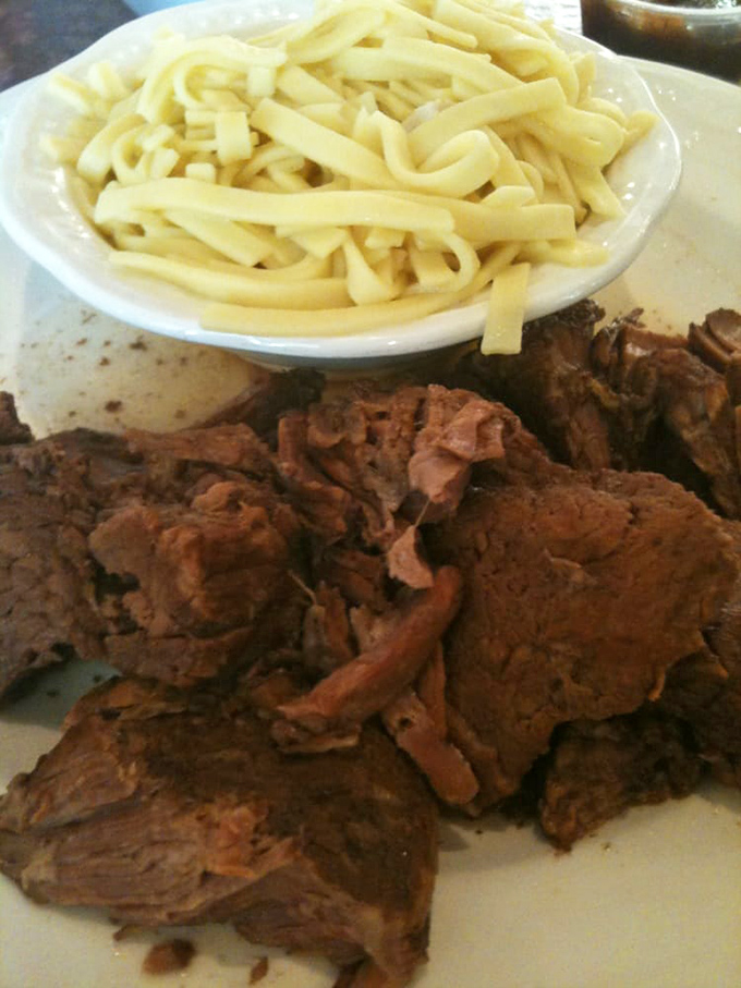 Tender roast beef alongside buttery noodles – a combination so perfect it makes you wonder why fancy restaurants bother with complicated food when this exists.