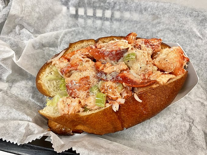 This lobster roll isn't just a sandwich—it's a coastal vacation between bread. Maine would be jealous of this Florida interpretation. 