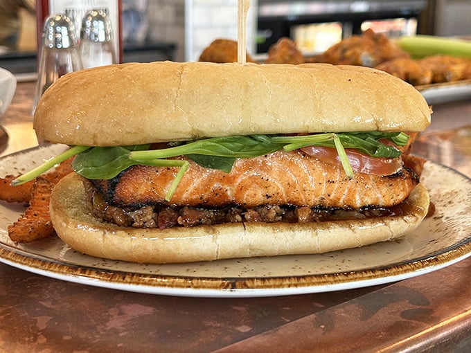 The star of the show: a salmon sandwich that makes other sandwiches question their life choices. That perfect sear deserves a standing ovation.