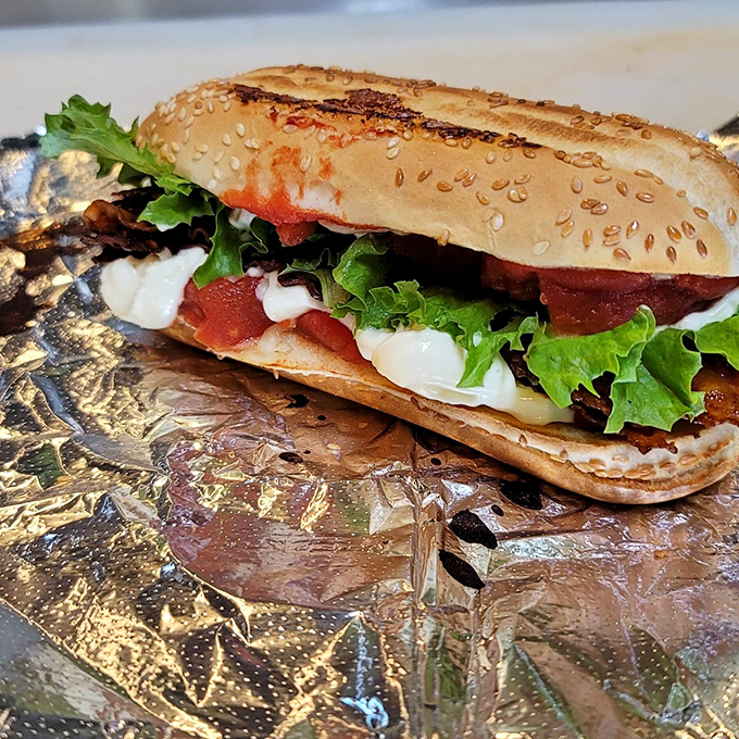 This isn't just a sandwich—it's edible architecture, where fresh vegetables and quality ingredients create a masterpiece that makes fast food chains weep with inadequacy.