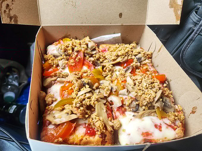 This isn't just sausage pizza – it's a meaty masterpiece where sweet peppers and mushrooms join forces with crumbled sausage in perfect harmony.