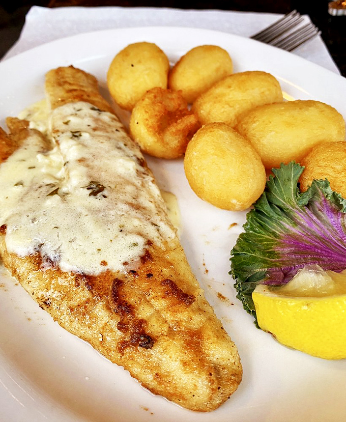 Behold the star of the show: sautéed walleye with golden potato puffs. That fish has a tan better than anything I achieved all summer.