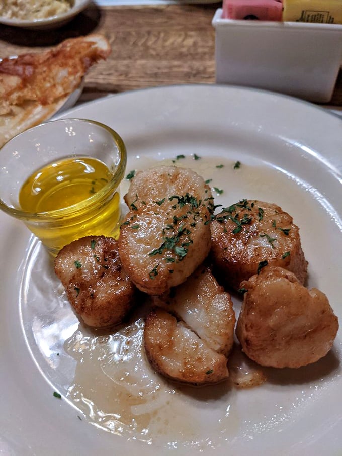 These seared scallops aren't just cooked—they're respected. Golden-brown perfection with a buttery sheen that would make Neptune himself request a reservation. 