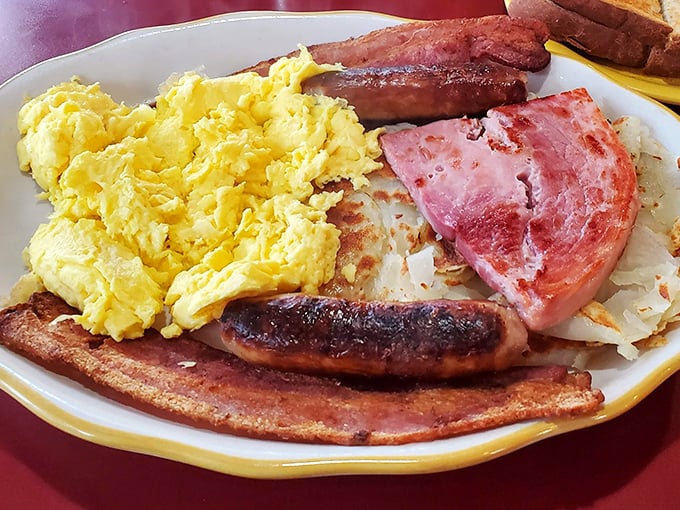 The star of the show: scrambled eggs with salami that somehow transforms two simple ingredients into something that belongs in the Breakfast Hall of Fame.