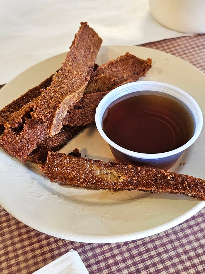 The legendary scrapple fries—crispy, savory Pennsylvania Dutch magic transformed into finger food that would make even vegetarians consider a cheat day.